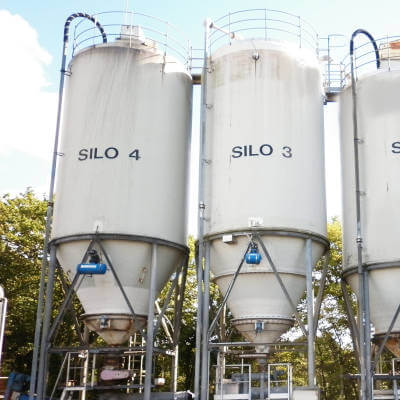 Manutention des produits en vrac stockés en silo par fond vibrant Iserco